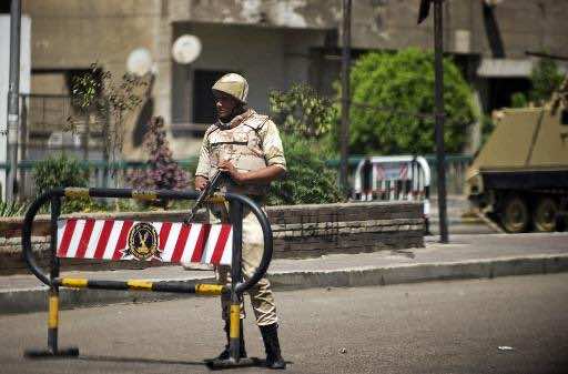 Blast at Cairo checkpoint wounds two police