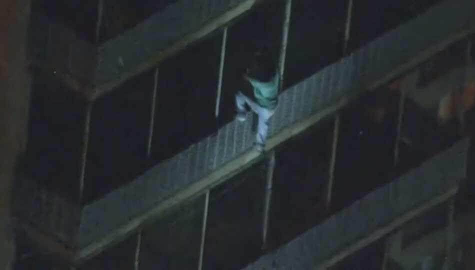 Video: Man Scales High-Rise Building to Save Bedridden Mother